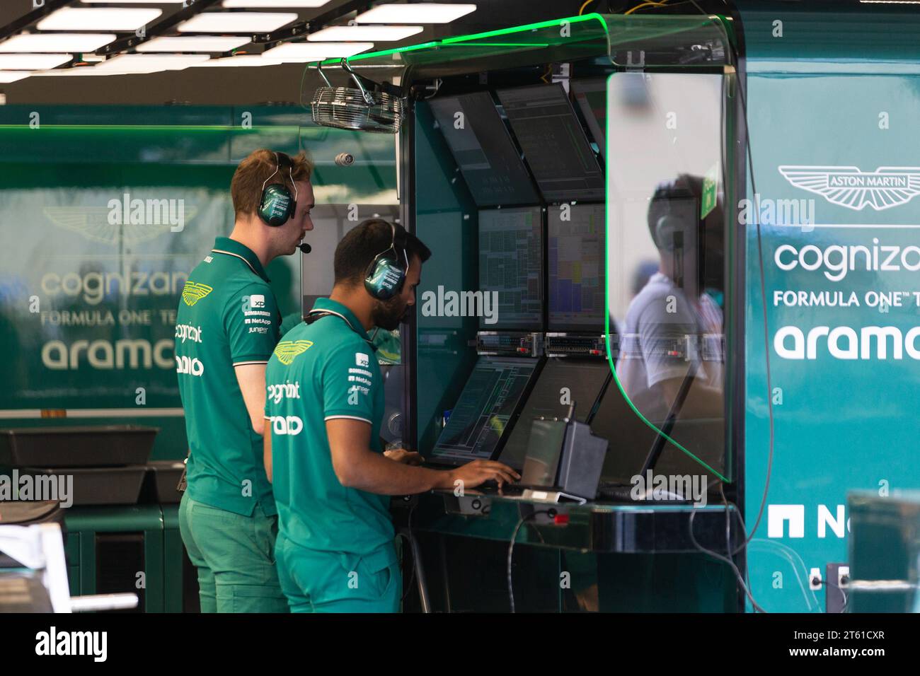 MECHANICS working on the ASTON MARTIN ARAMCO COGNIZANT F1 TEAM car at the garage as part of the ...