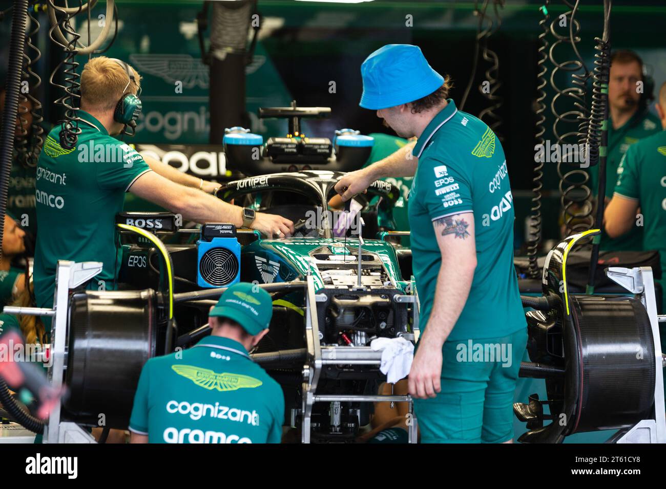 MECHANICS working on the ASTON MARTIN ARAMCO COGNIZANT F1 TEAM car at the garage as part of the ...