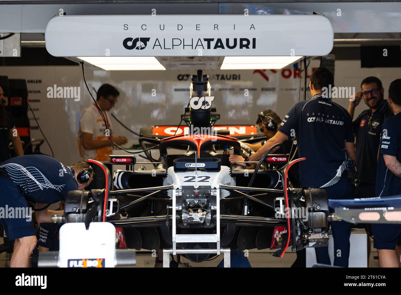 MECHANICS working on the SCUDERIA ALPHATAURI car at the garage as part of the 2023 F1 Sao Paulo ...