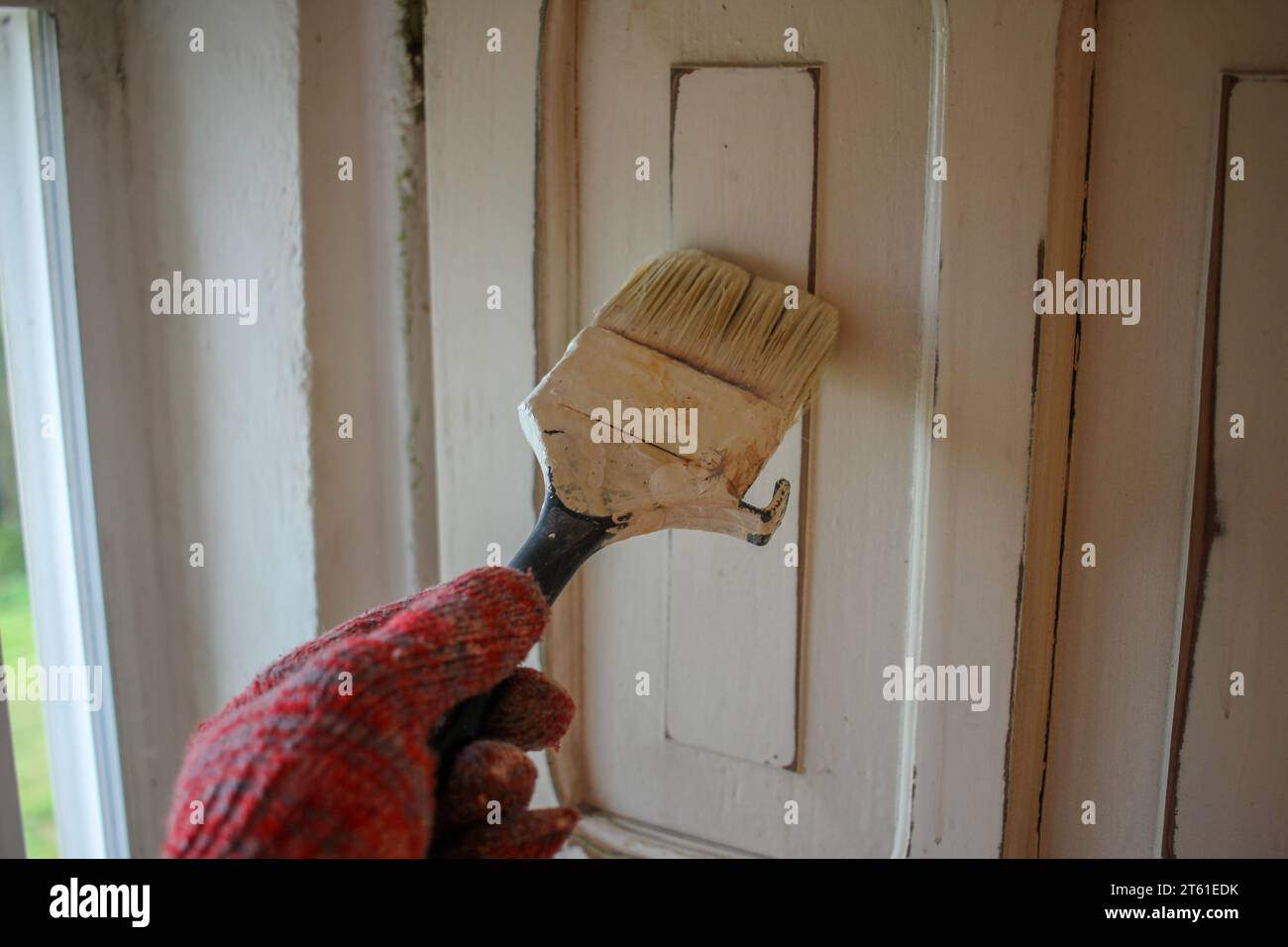 painting an old , wooden window in an old house Stock Photo - Alamy