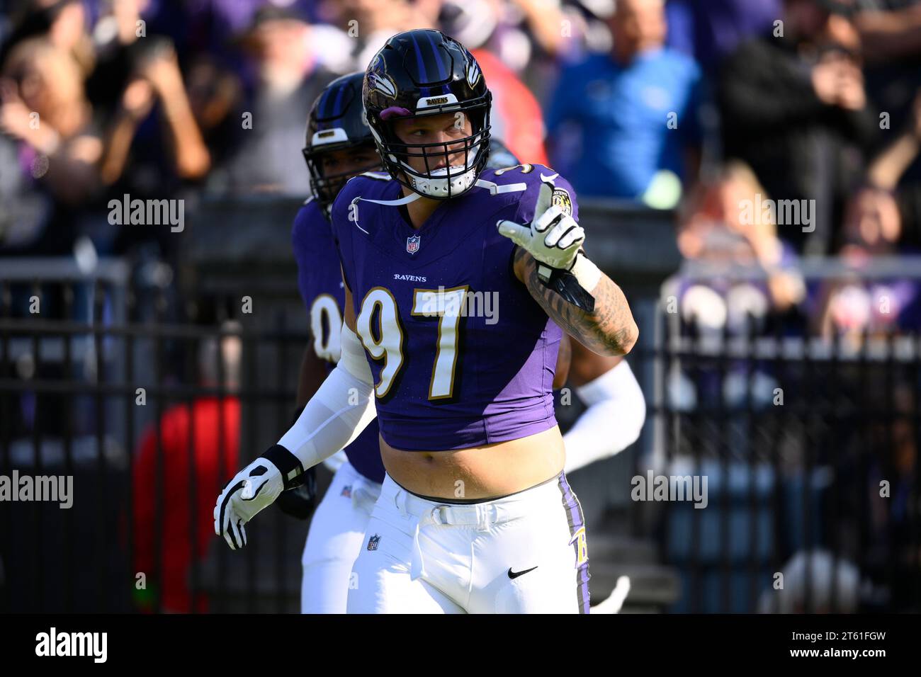 Baltimore Ravens defensive end Brent Urban (97) takes to the field ...