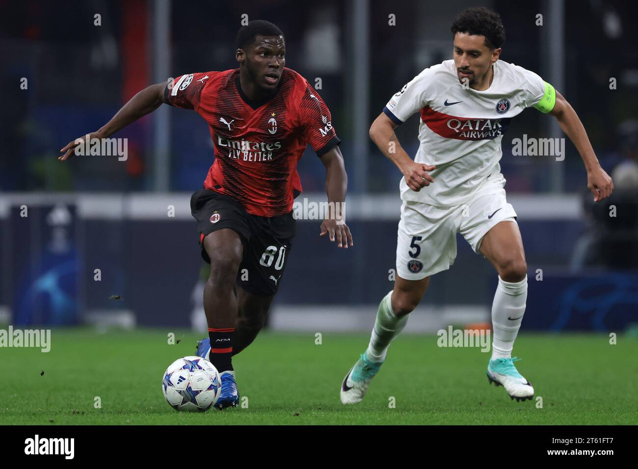 Milan, Italy. 7th Nov, 2023. Yunus Musah of AC Milan is pursued by Marquinhos of PSG during the ...