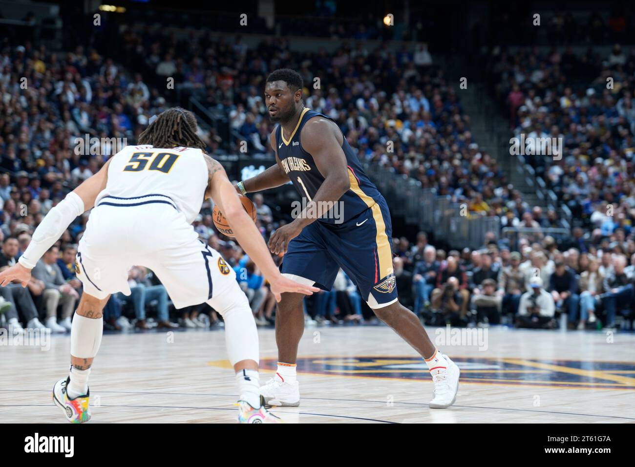 New Orleans Pelicans forward Zion Williamson (1) and Denver Nuggets ...