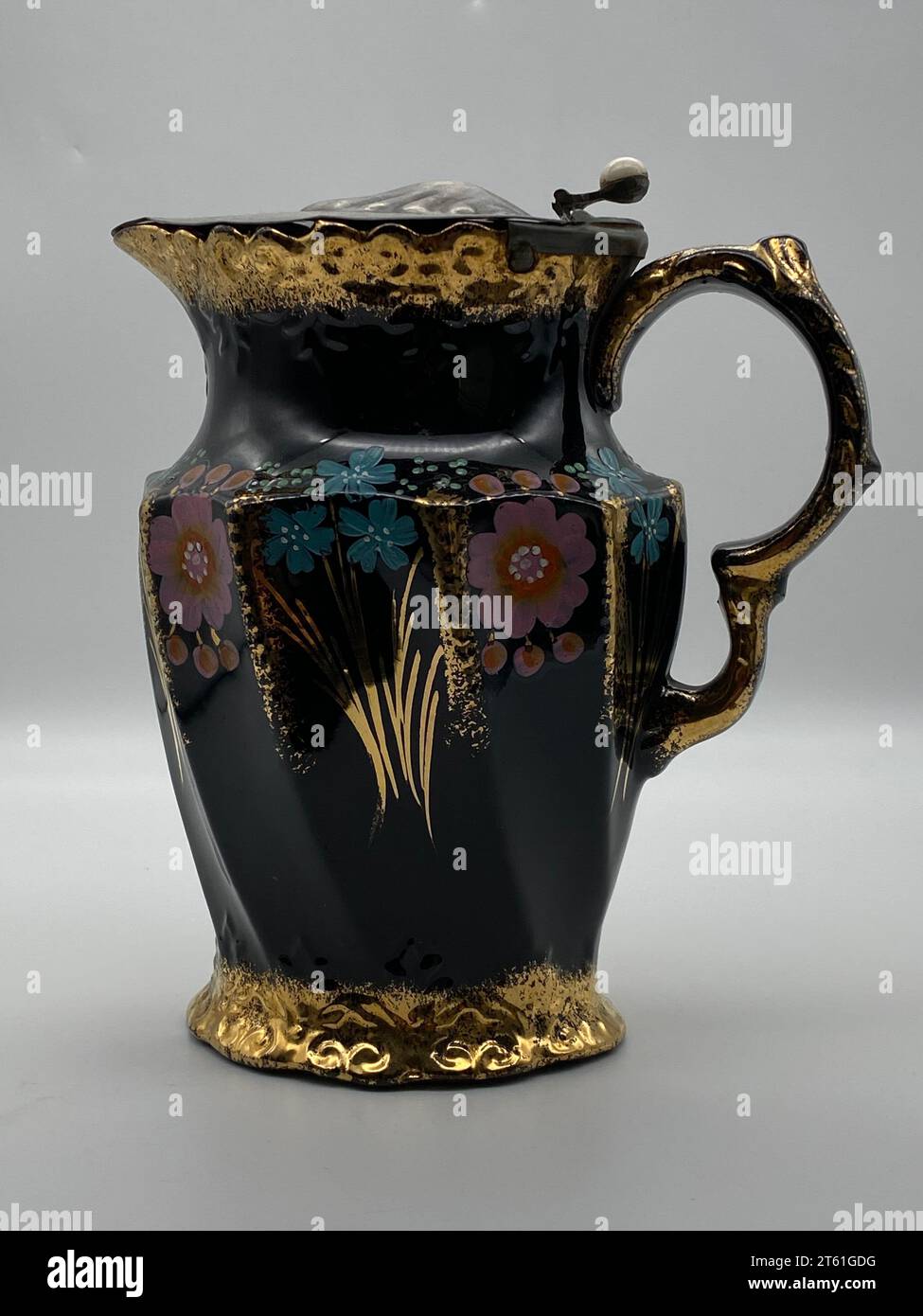 A high-quality stock photo of a decorative pitcher, beautifully ...
