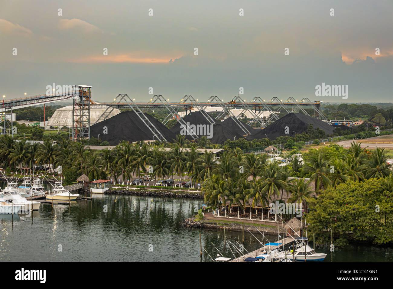 Guatemala, Puerto Quetzal - July 20, 2023: Evening sky. Black coal ...