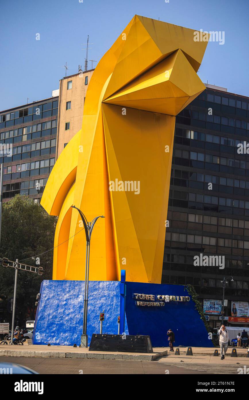 Statue El Caballito, yellow in color by sculptor Enrique Carbajal ...