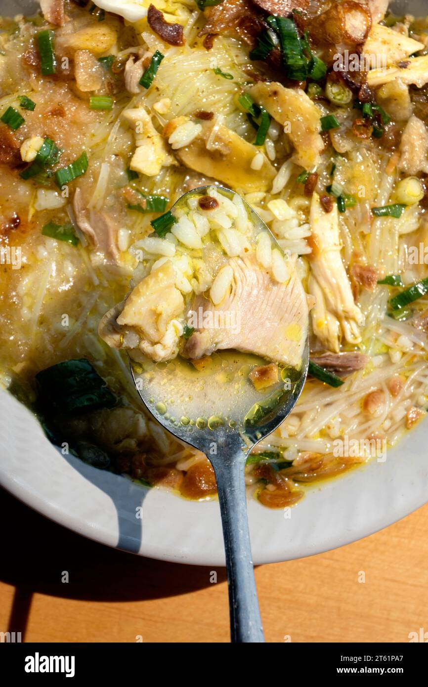 Chicken soup (Soto Ayam) is ready to serve. Traditional Indonesia food ...
