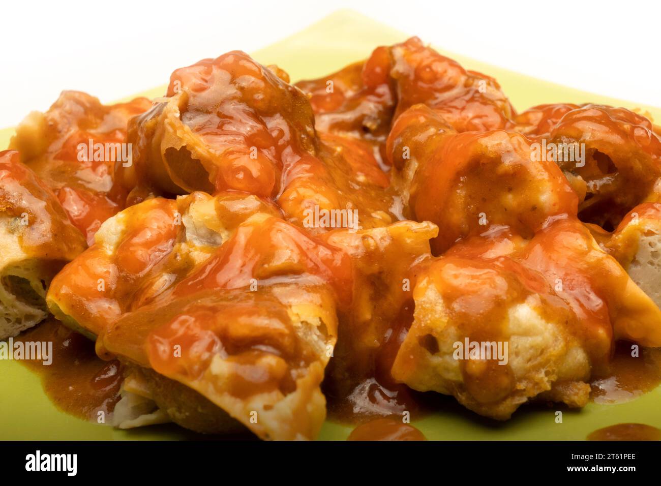 Batagor (Bakso Tahu Goreng) is served with peanut sauce and sauce on ...