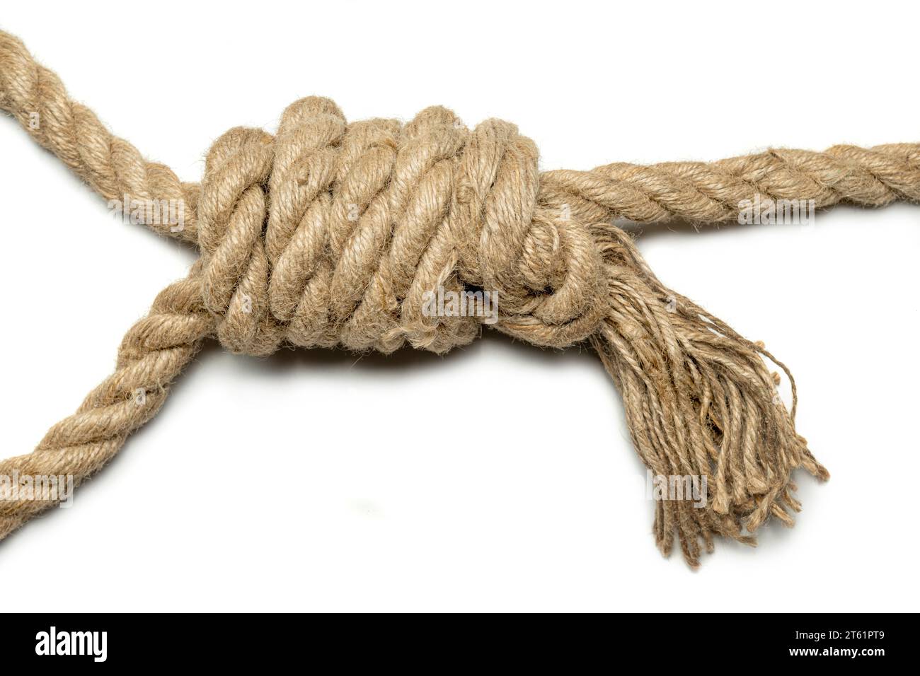 Coiled rope knot isolated over a white background Stock Photo - Alamy