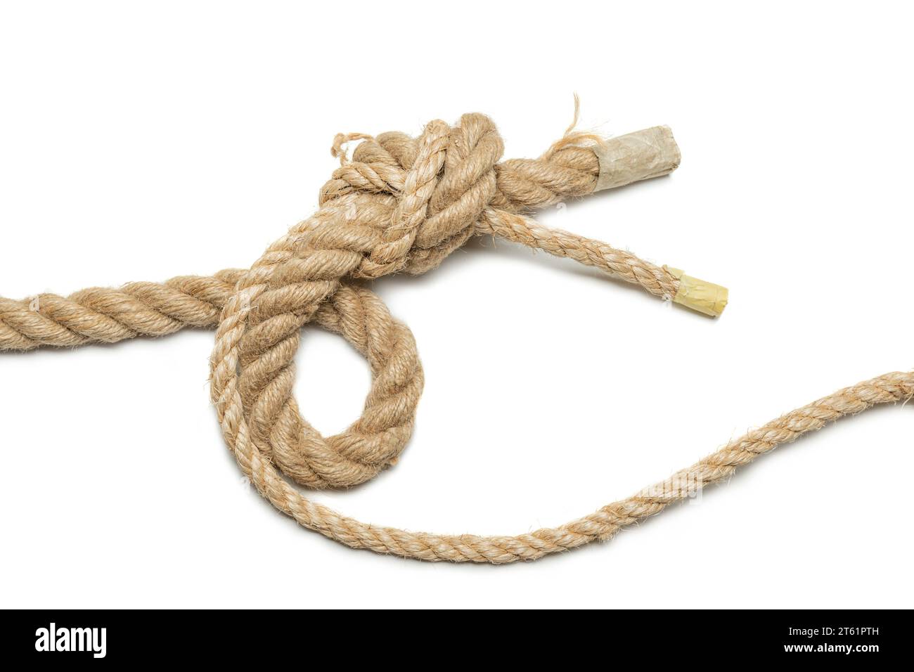 Coiled rope knot isolated over a white background Stock Photo - Alamy
