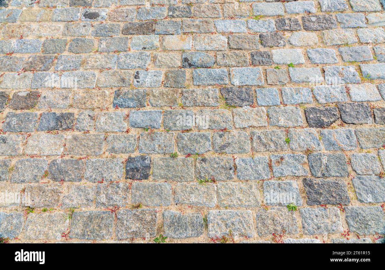 Stone pavement in the rays of the setting sun. Backround of Block ...