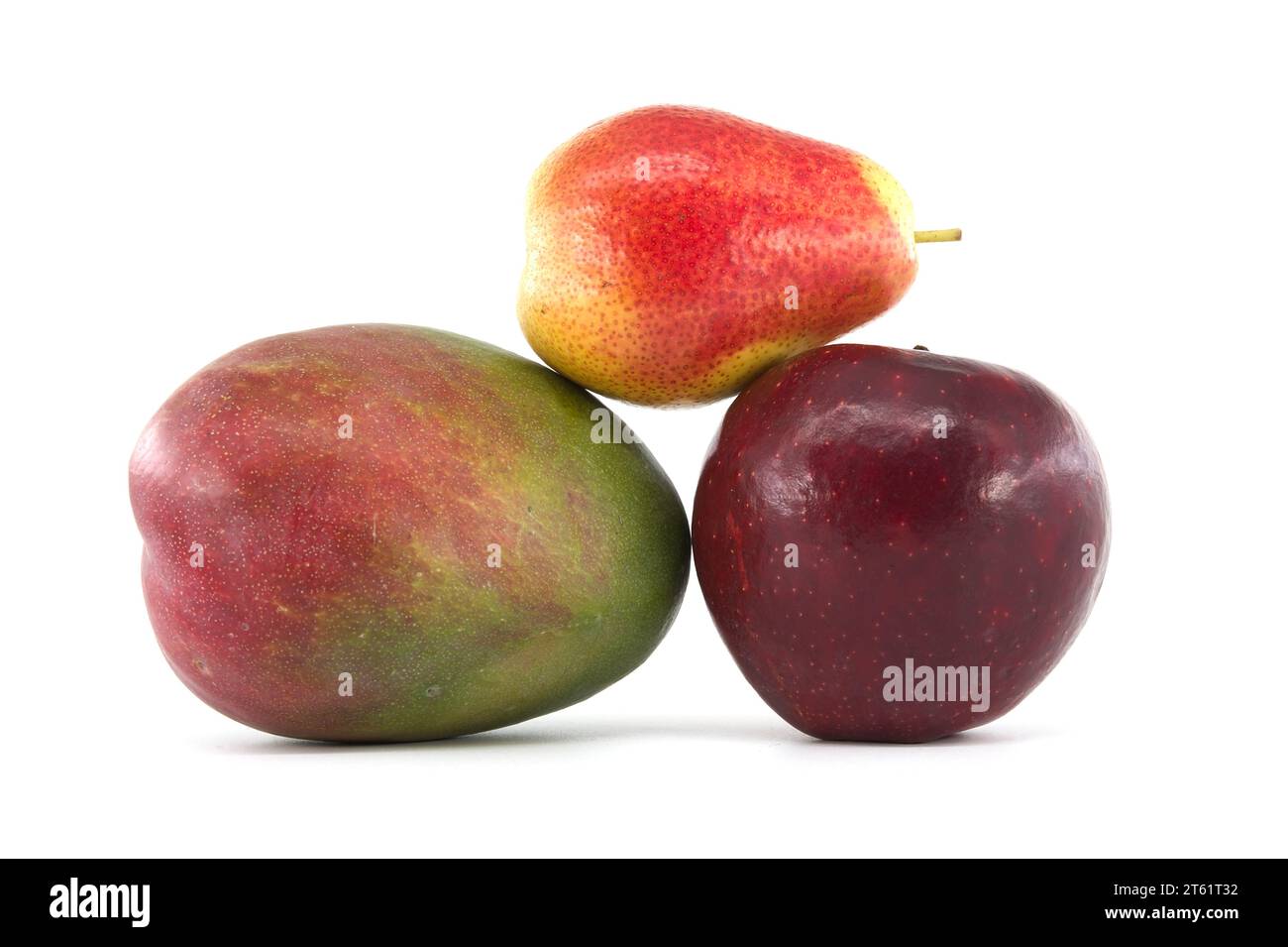 Fresh whole multicolored ripe mango, pears and red apple fruits ...