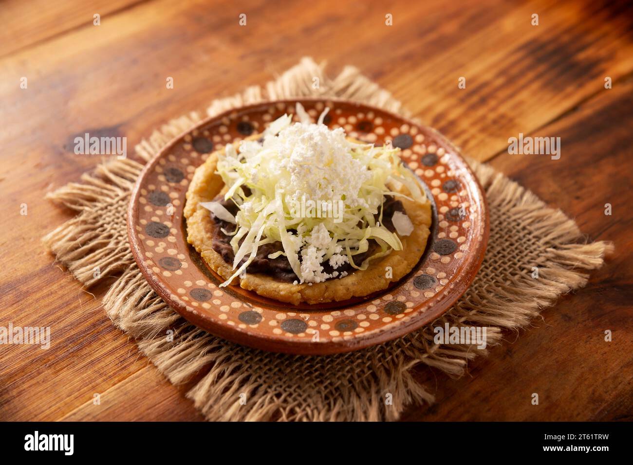 Sope. Mexican typical food prepared with flattened fried corn dough ...