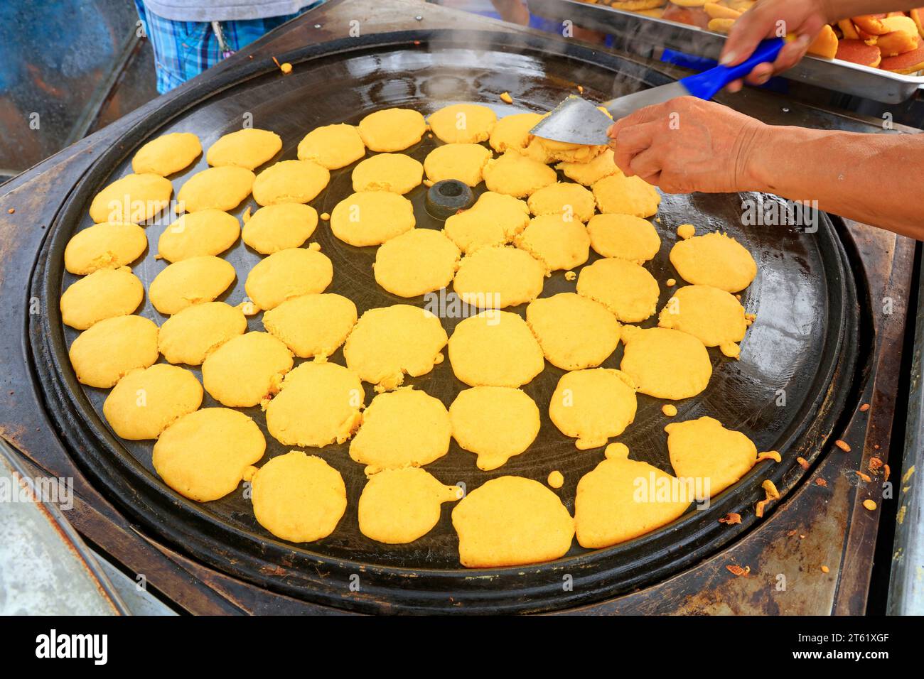 Corn cake cooking Stock Photo - Alamy