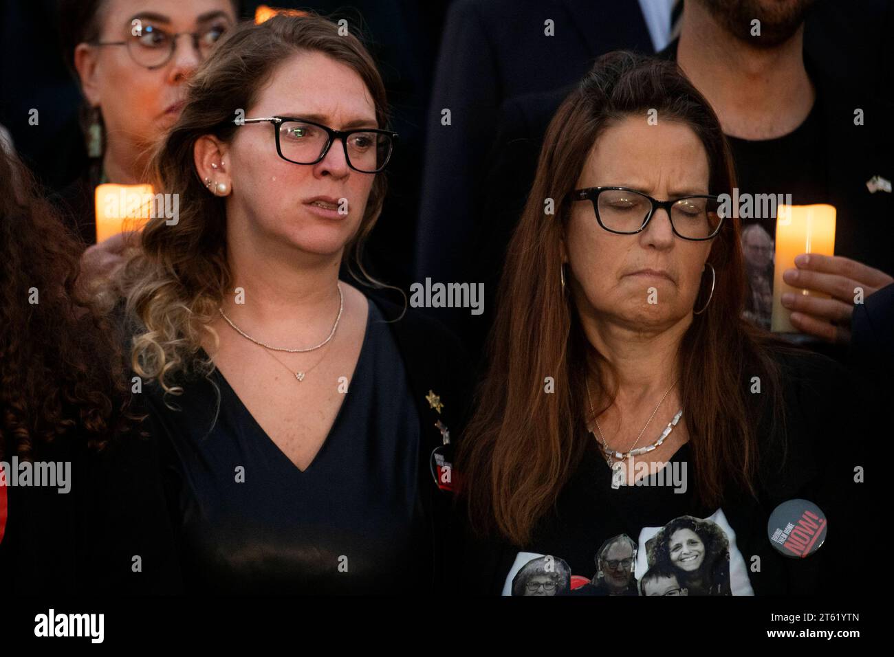 Tears run down the cheek of Shani Segal, as Congressional Members are ...