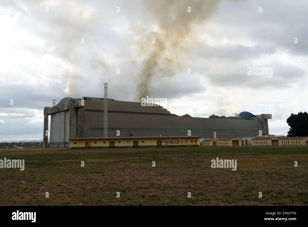 Navy blimp hanger on fire Stock Photo - Alamy