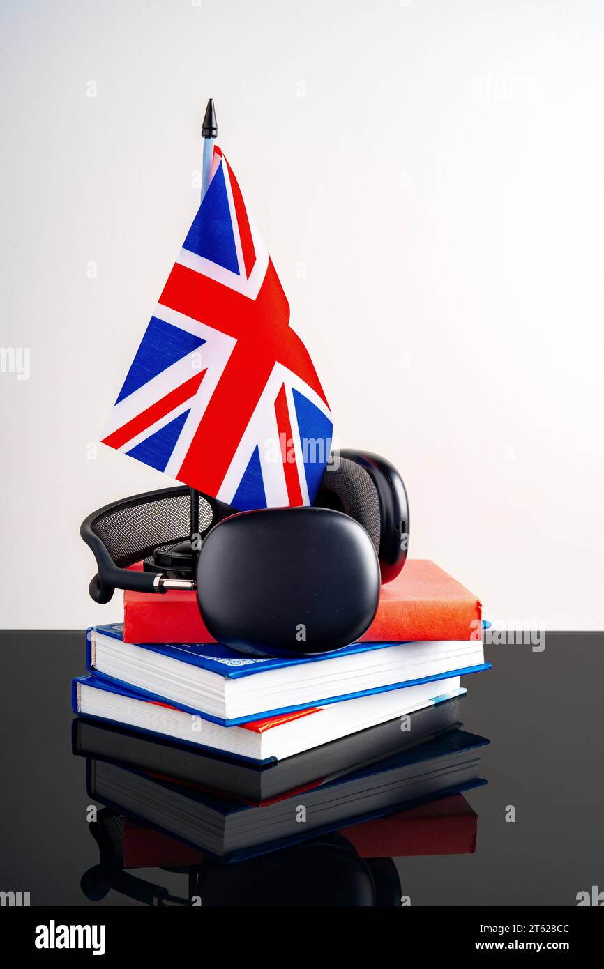 English language learning concept with books and flag of Great Britain ...