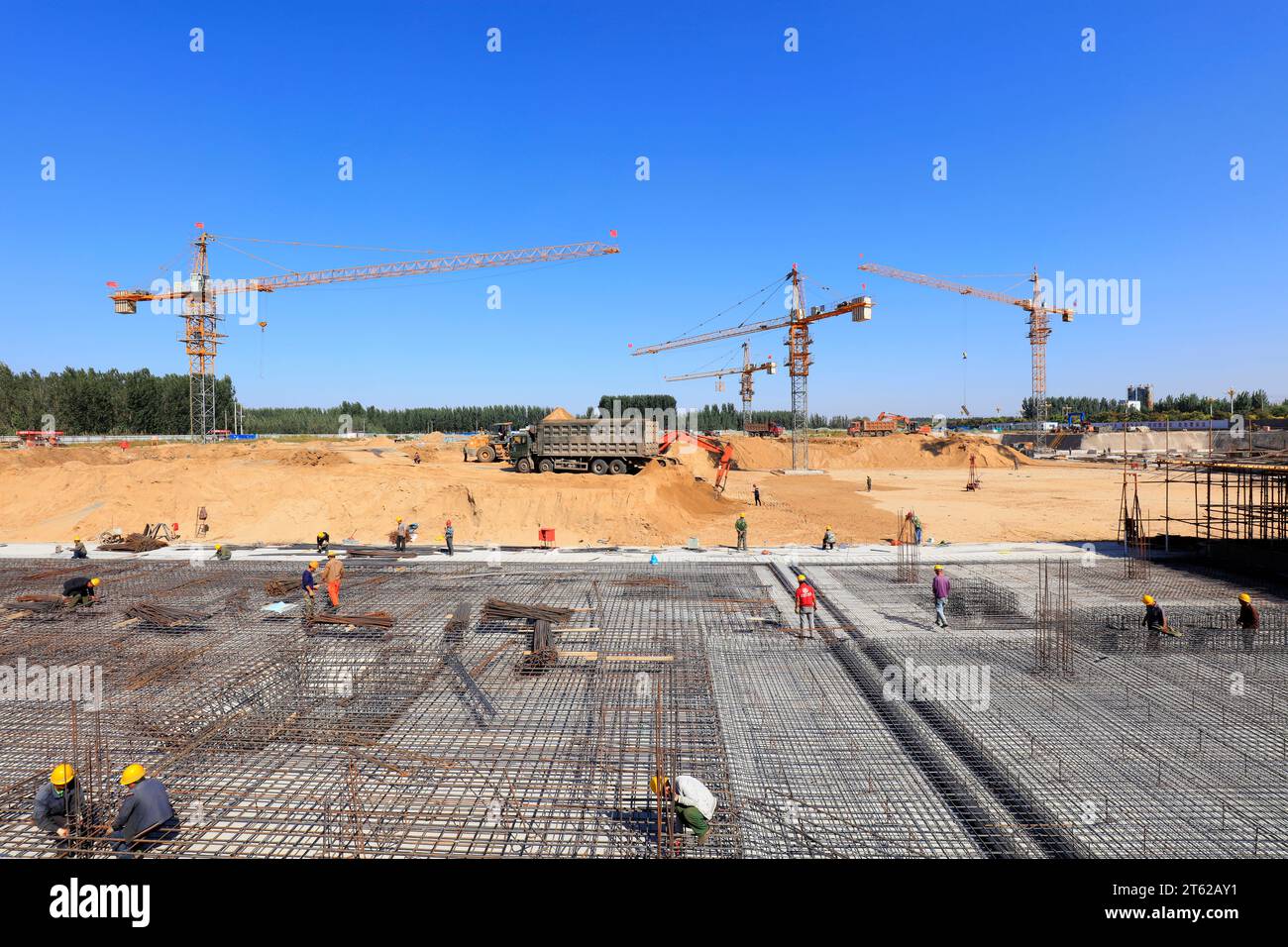 Construction site scene Stock Photo - Alamy
