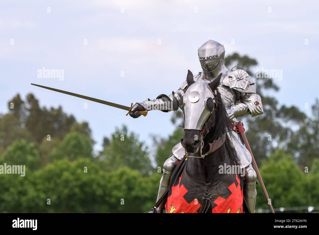 Knight jousting. Medieval knights during a jousting tournament. Knights competition Stock Photo ...