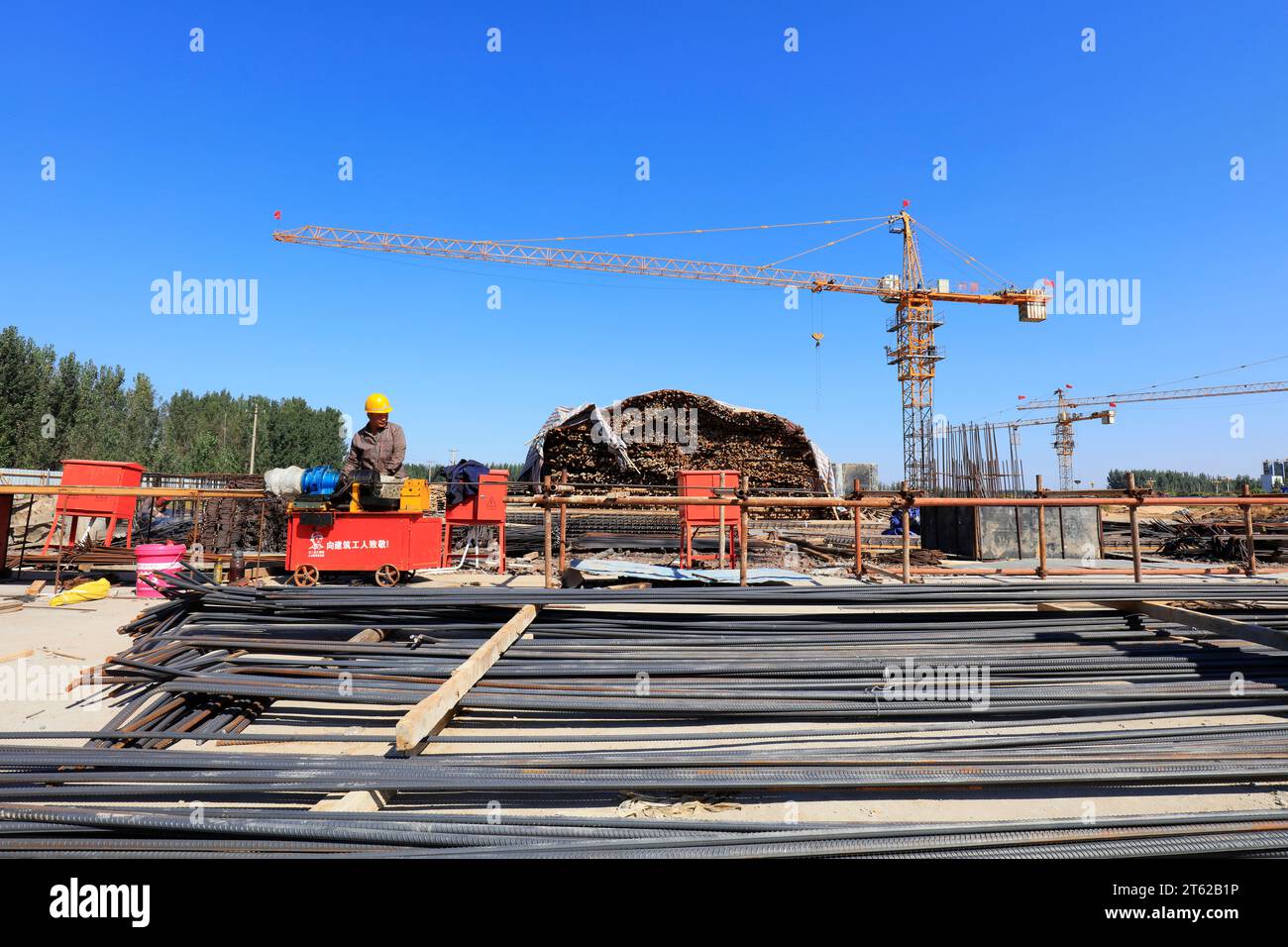 Construction site scene Stock Photo - Alamy
