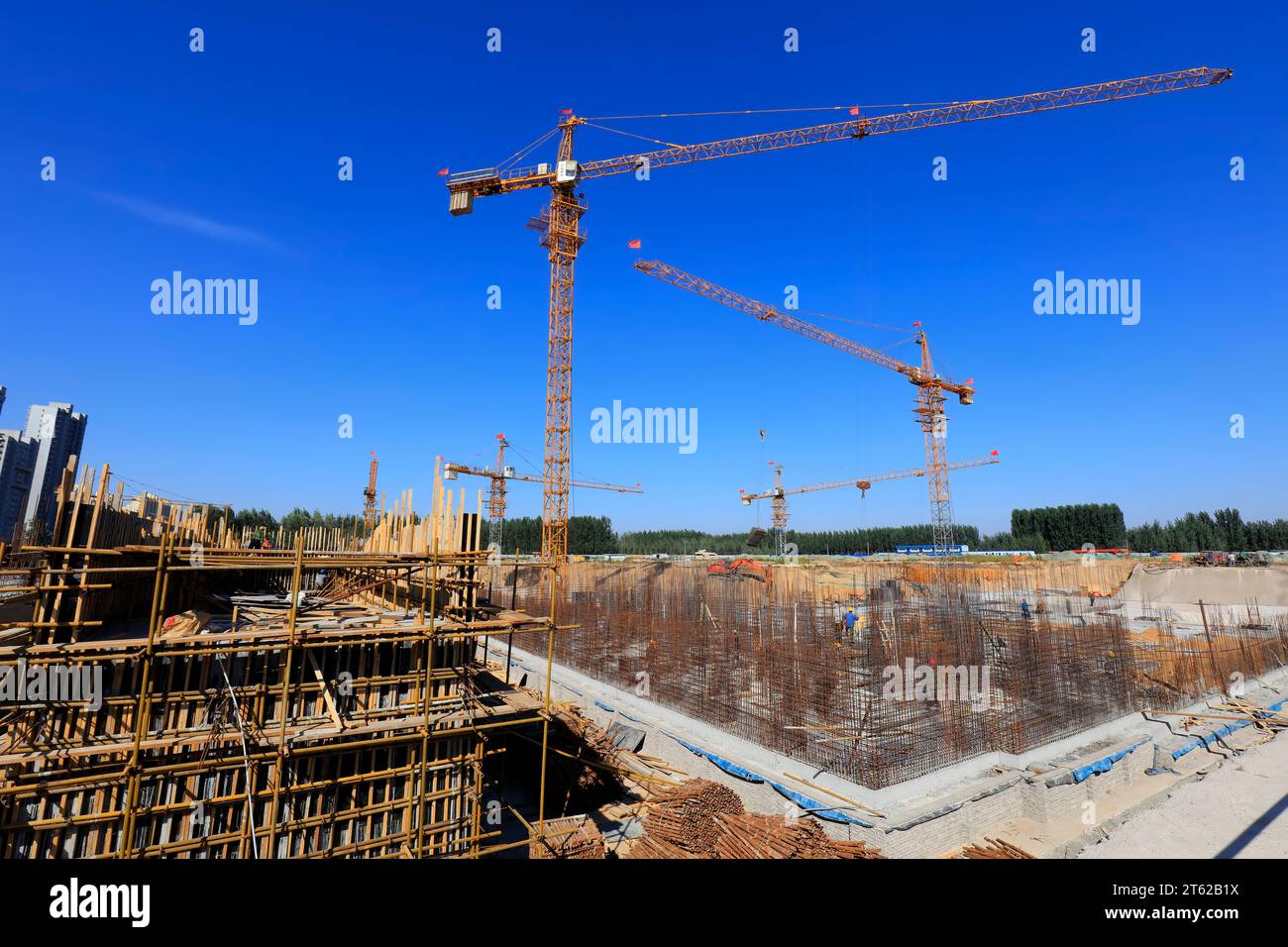 Construction site scene Stock Photo - Alamy