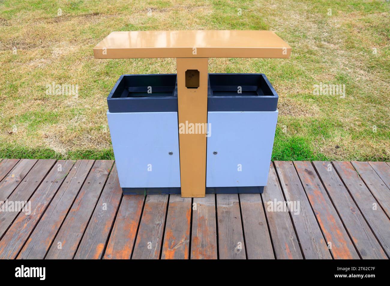 Garbage boxes and wooden floors Stock Photo - Alamy
