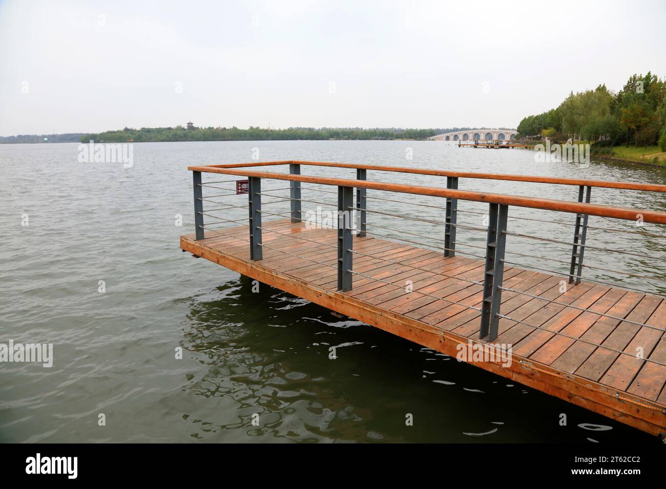 wooden platform at the water side Stock Photo - Alamy