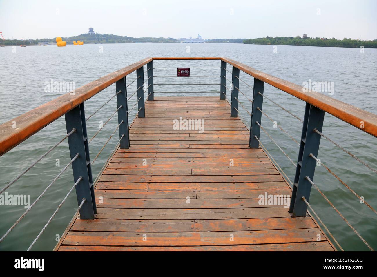 wooden platform at the water side Stock Photo - Alamy