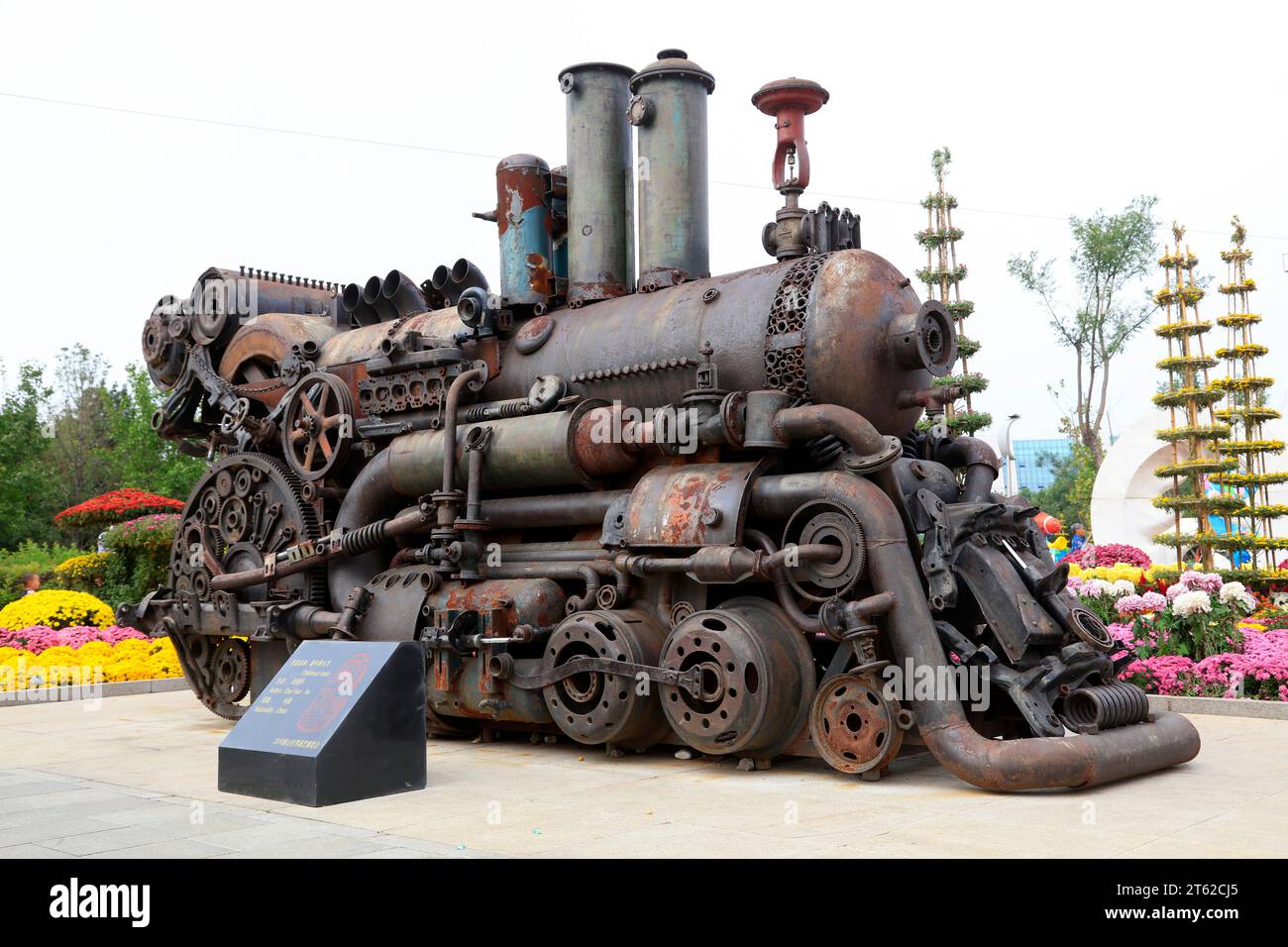 sculpture of train head in a park, Tangshan, China Stock Photo - Alamy