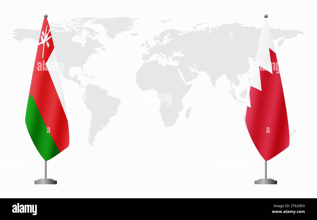 Oman and Bahrain flags for official meeting against background of world ...