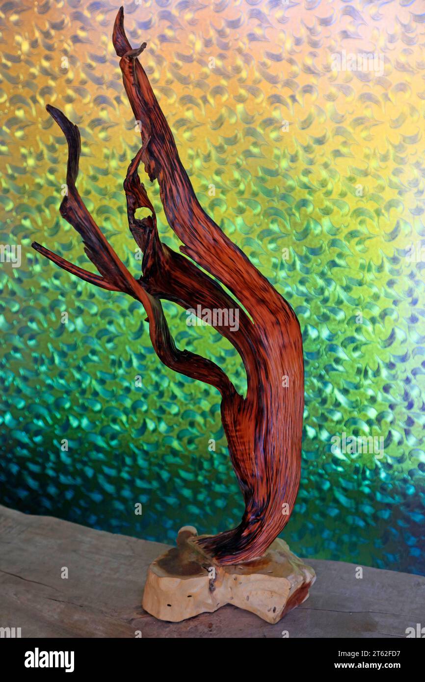 Craftwork of root carvings of cliff Stock Photo - Alamy