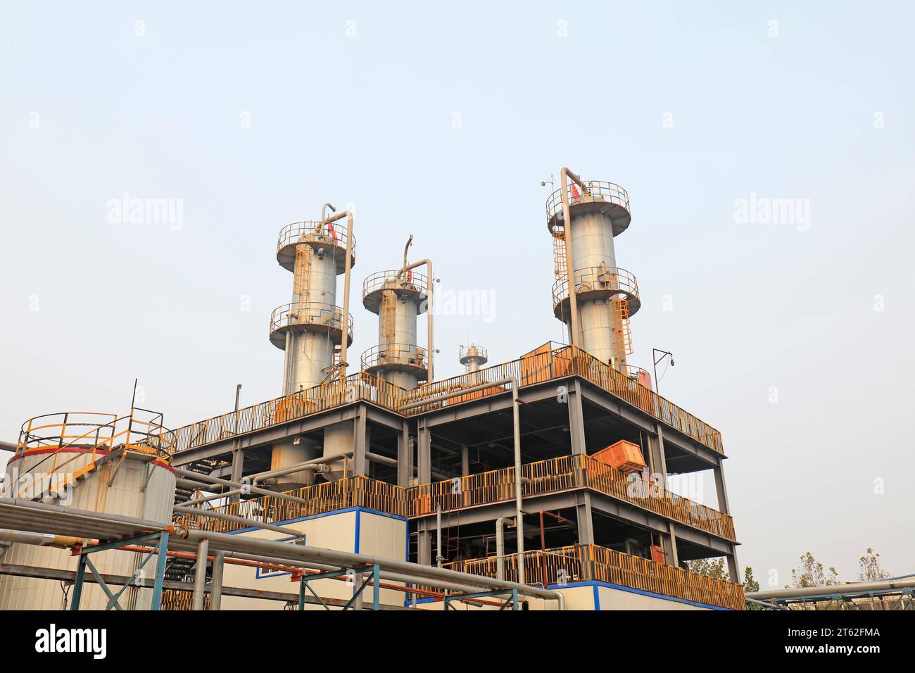 Distillation equipment and oil storage tank Stock Photo - Alamy