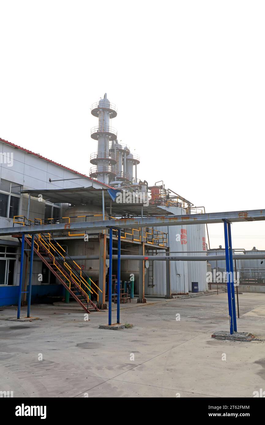 Distillation equipment and oil storage tank Stock Photo - Alamy