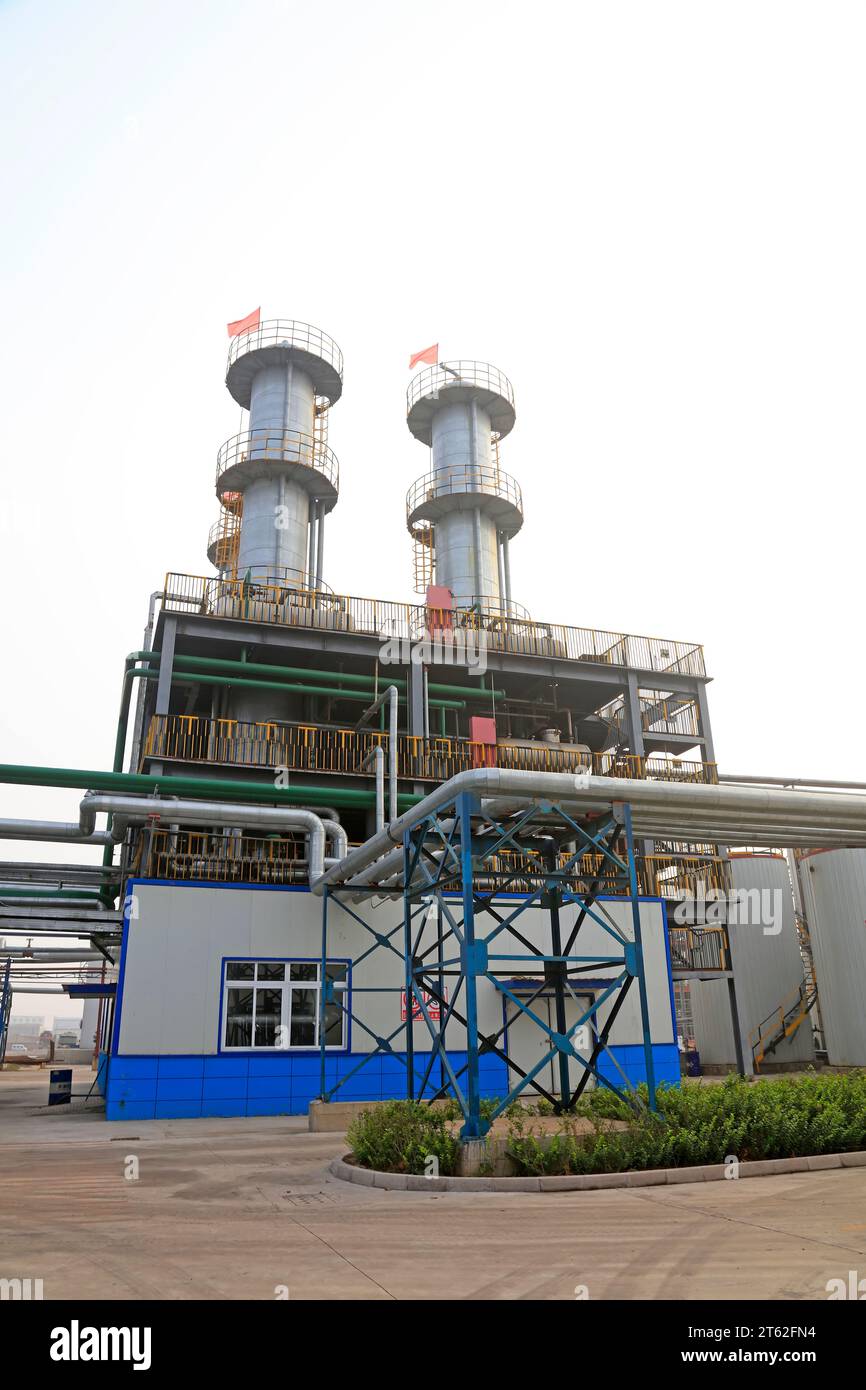 Distillation equipment and oil storage tank Stock Photo - Alamy