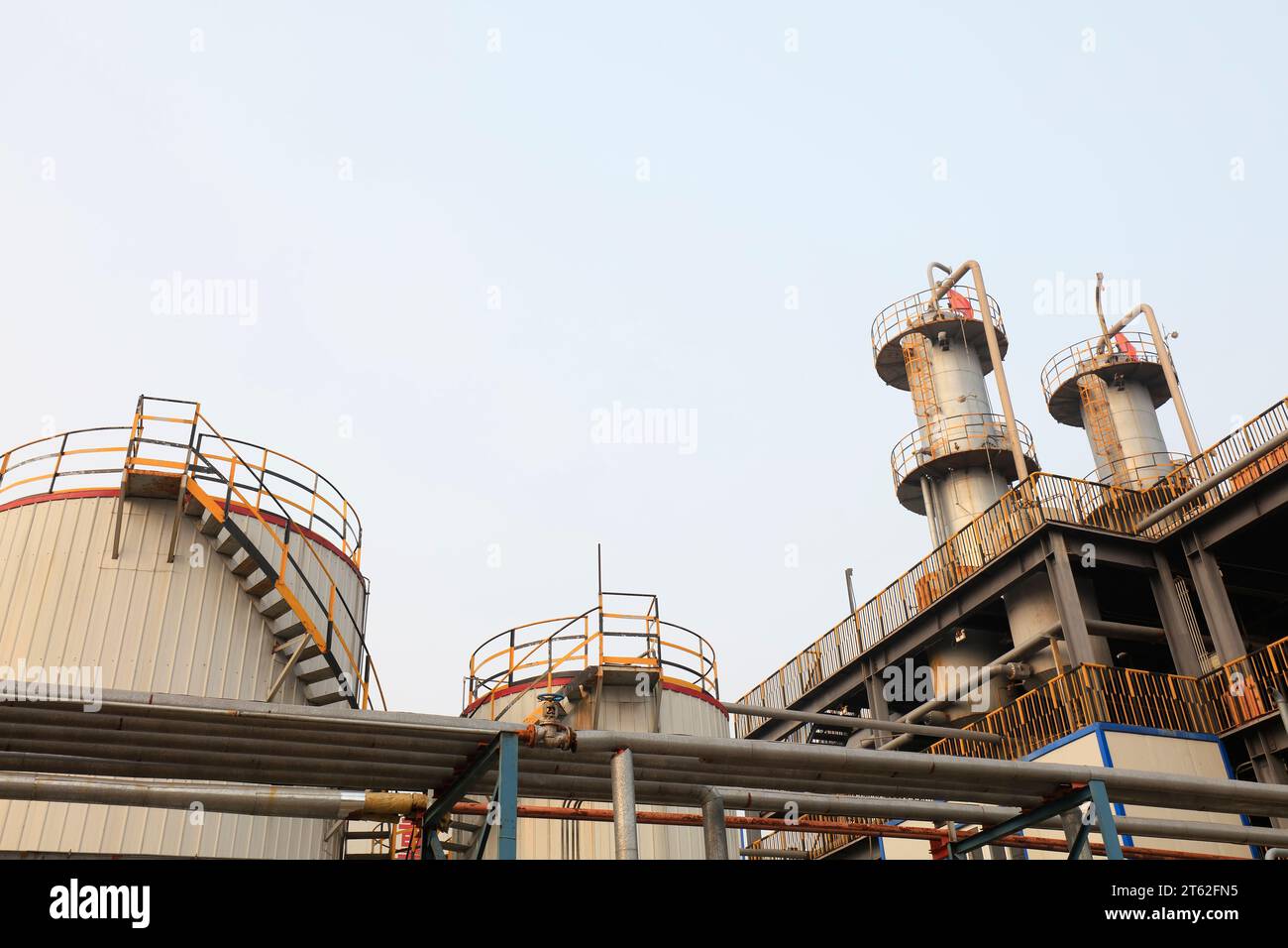 Distillation equipment and oil storage tank Stock Photo - Alamy