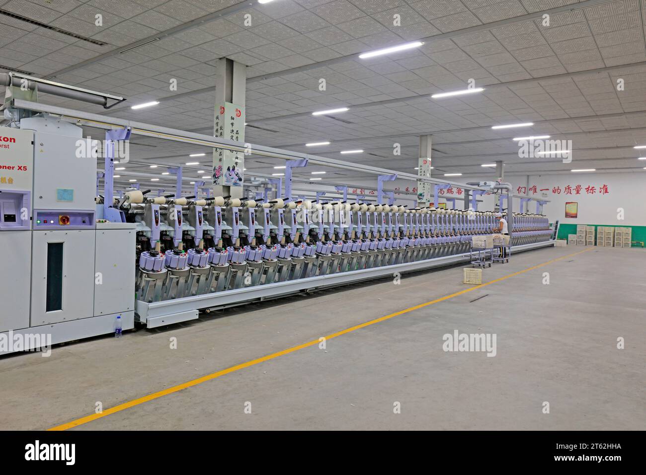Spinning production line Stock Photo - Alamy