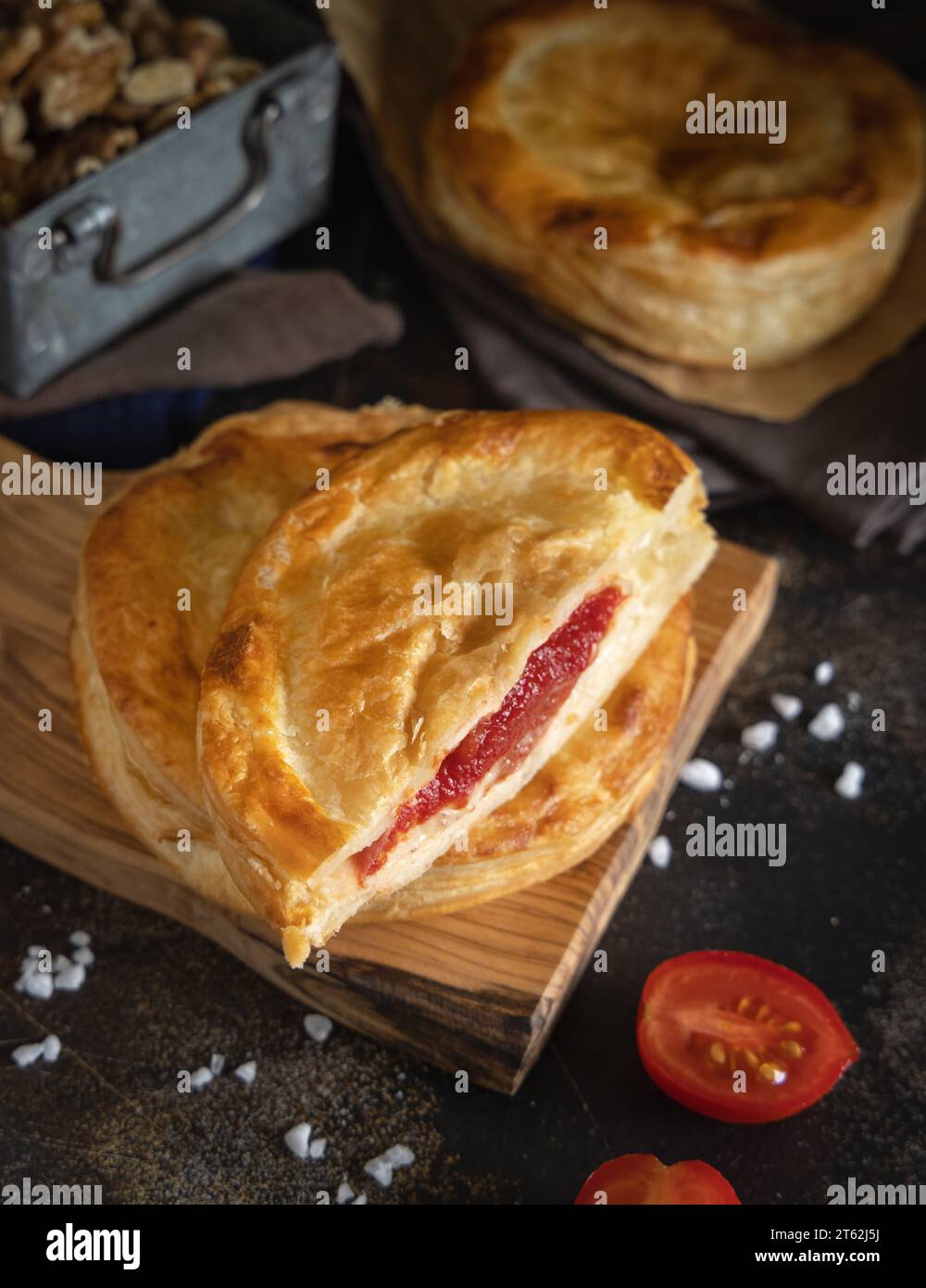 Rustico traditional puff pastry stuffed with bechamel sauce, tomato and ...