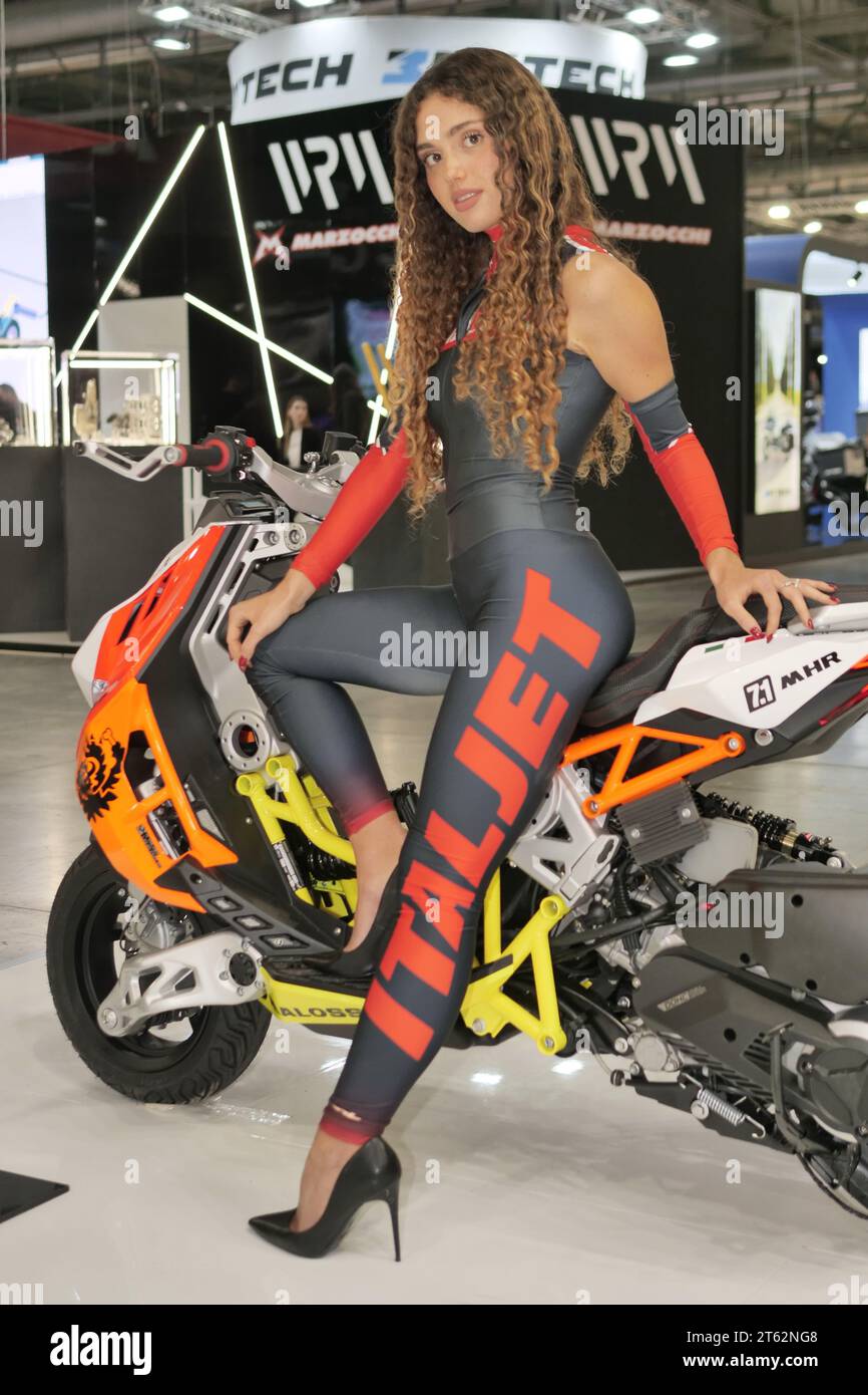 Models girls on the motorbike exposed at EICMA, international ...
