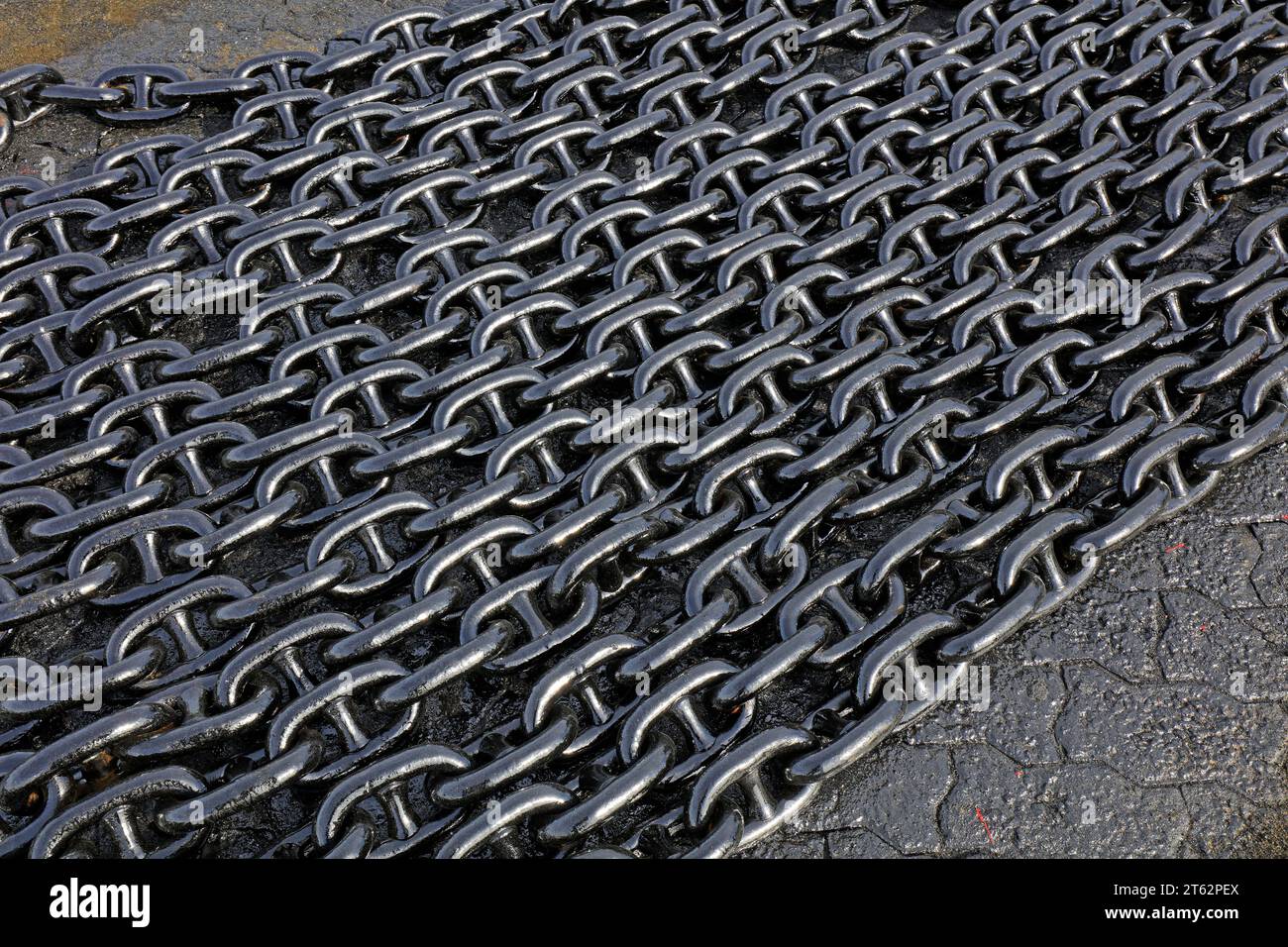oil washed the anchor chain Stock Photo - Alamy
