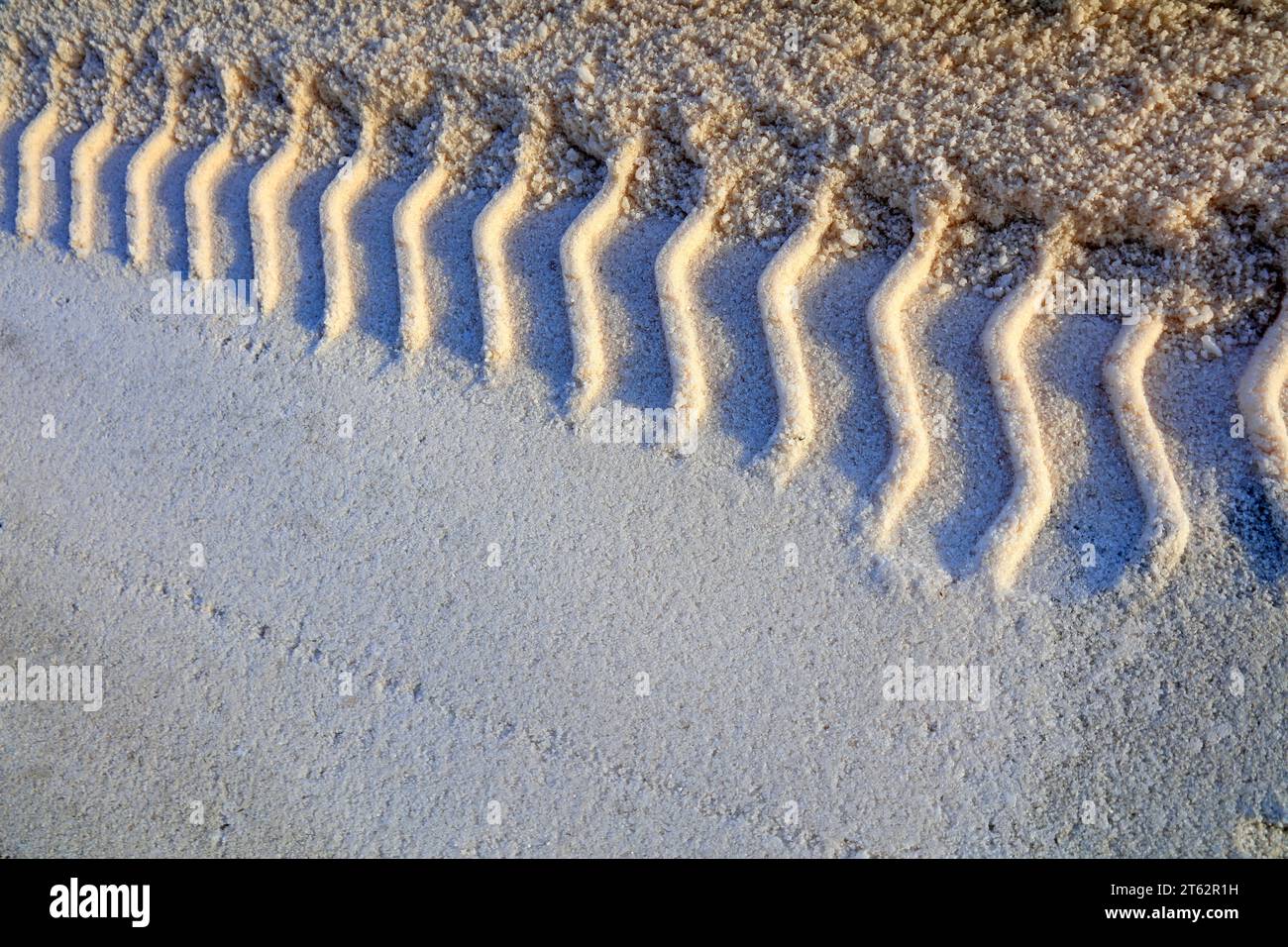 Wheel trace on salt Stock Photo - Alamy