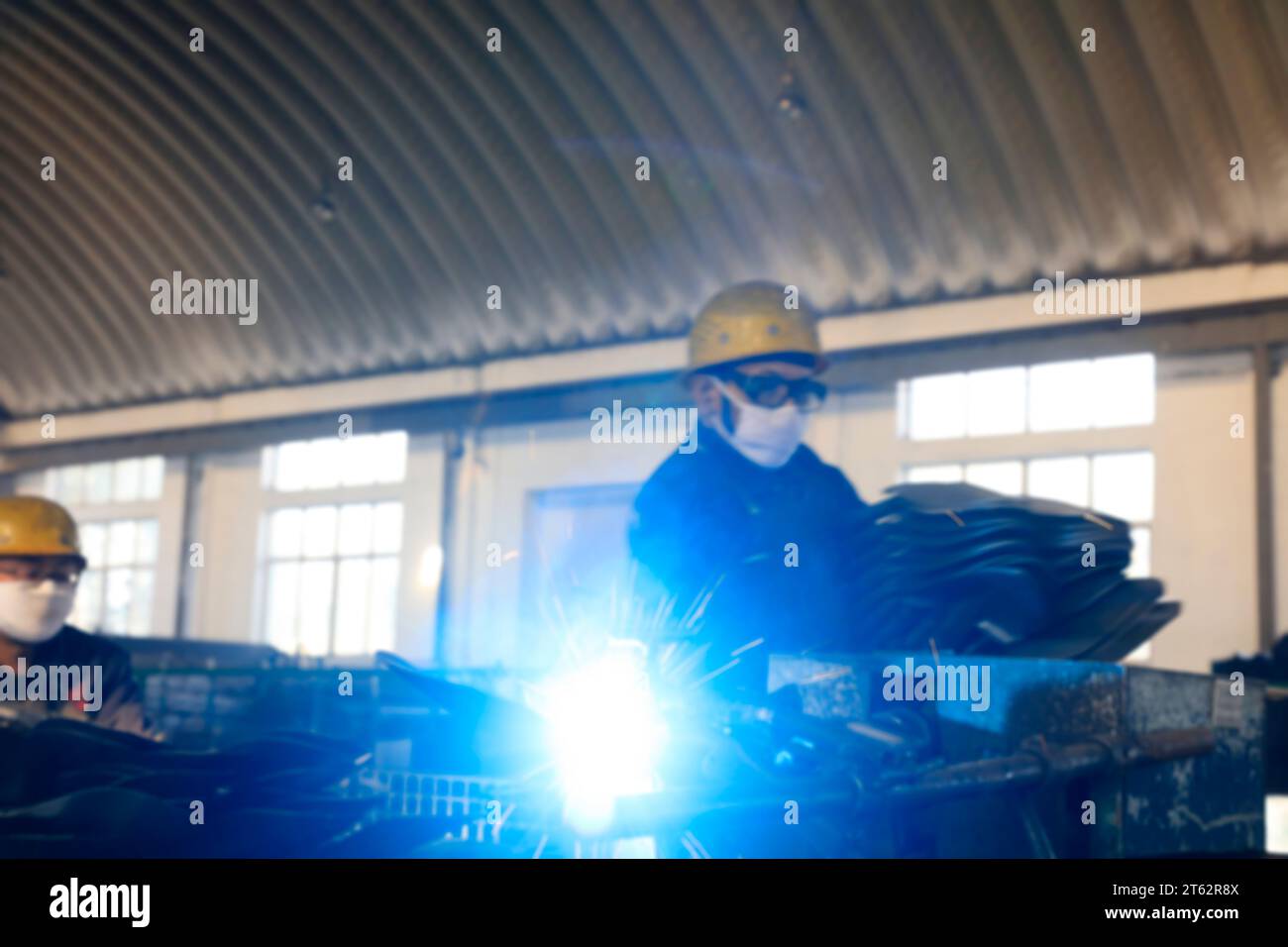 Steel shovel welding line, fuzzy scene Stock Photo - Alamy
