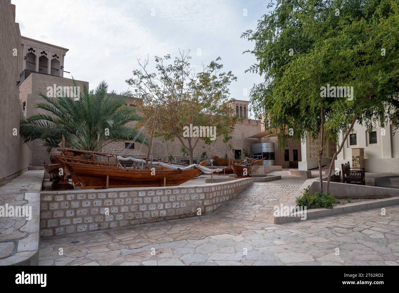 View of narrow clean streets between traditional stone buildings in old ...
