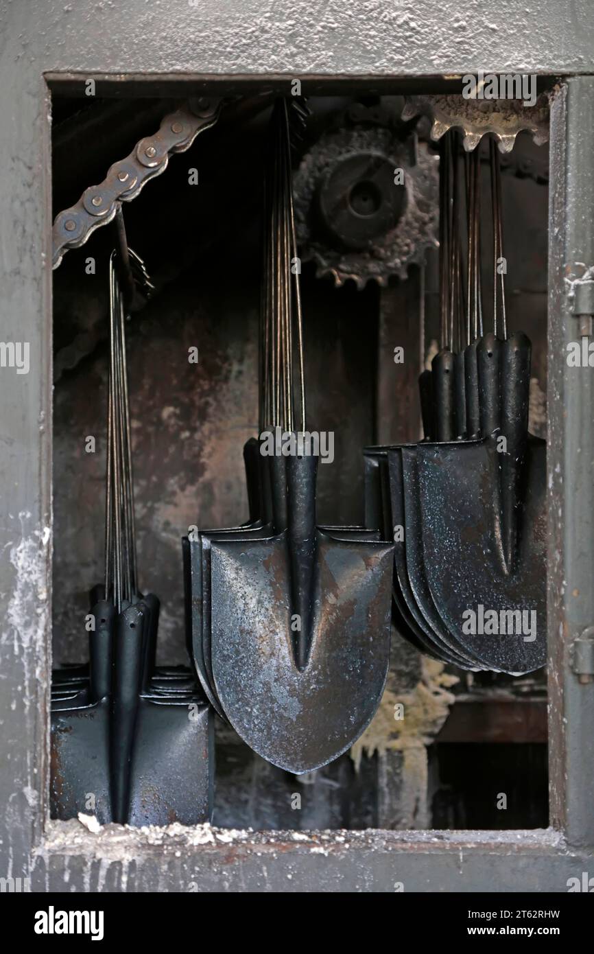 Steel spade on the production line Stock Photo - Alamy