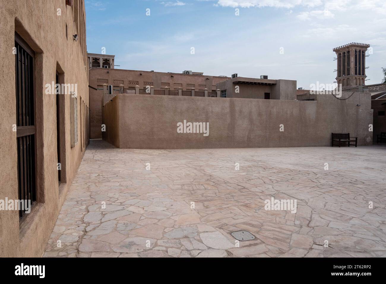 View of narrow clean streets between traditional stone buildings in old ...