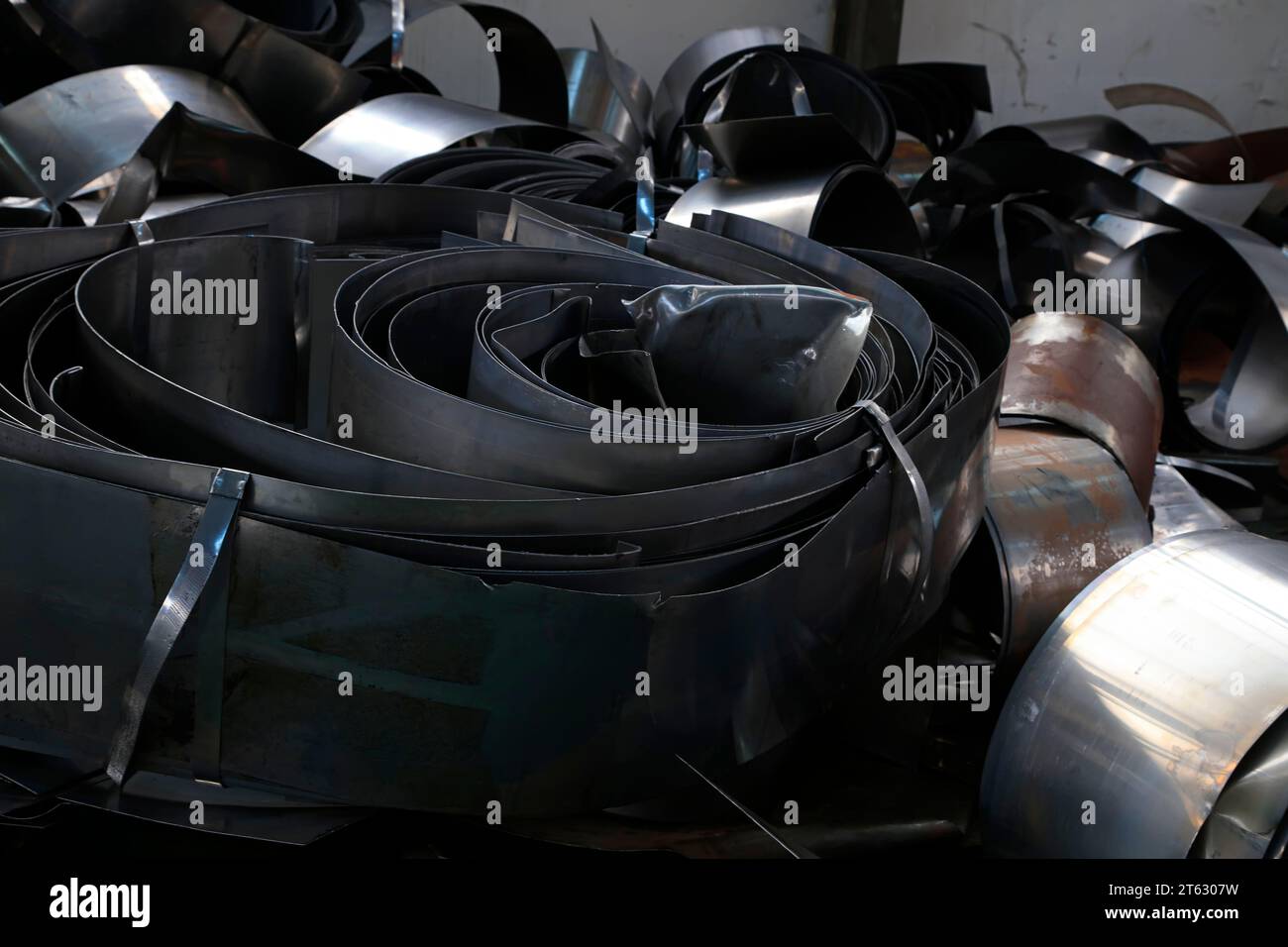Scrap strip steel Stock Photo - Alamy