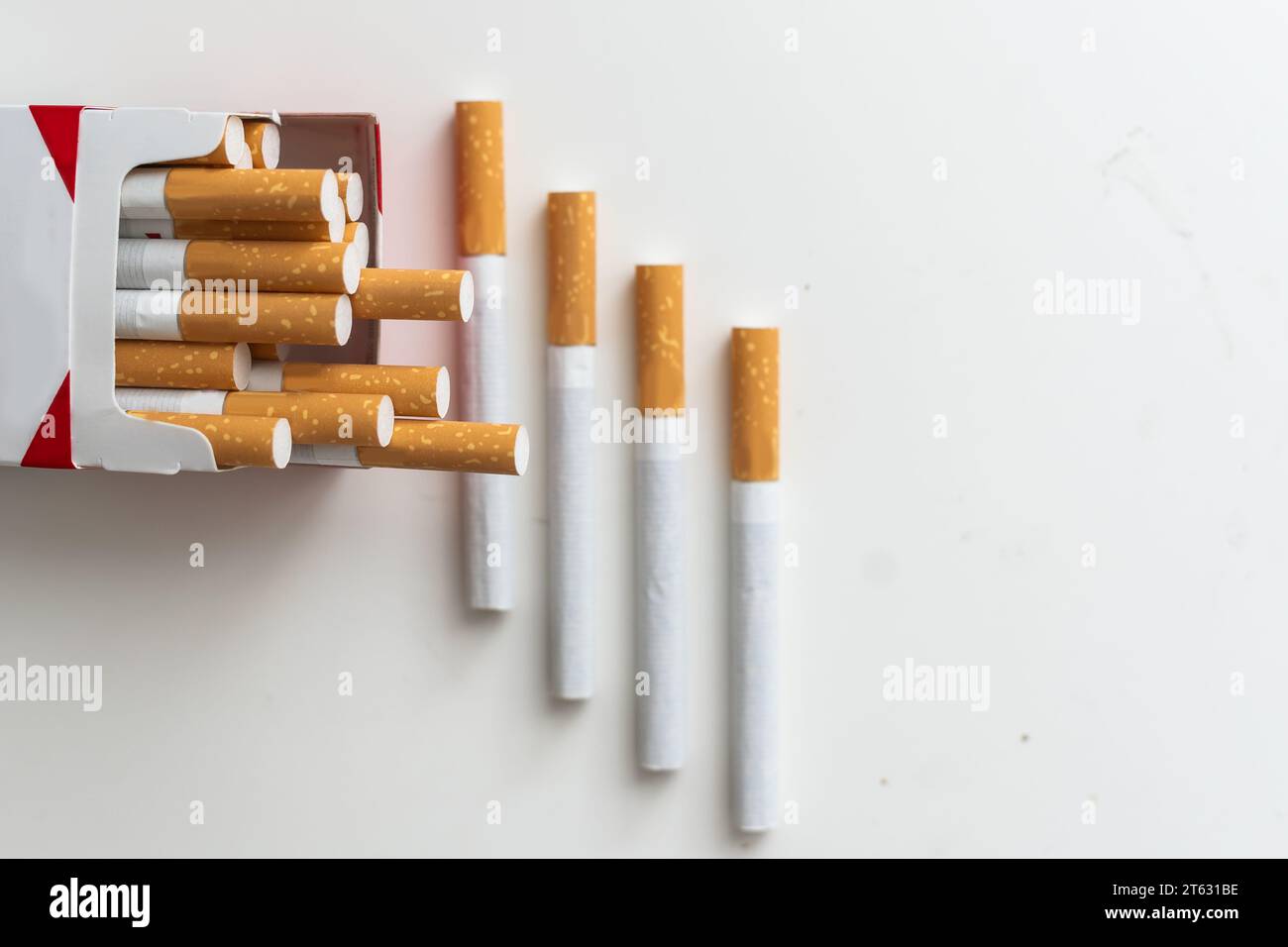 stairway of cigarettes isolated on a white background Stock Photo - Alamy