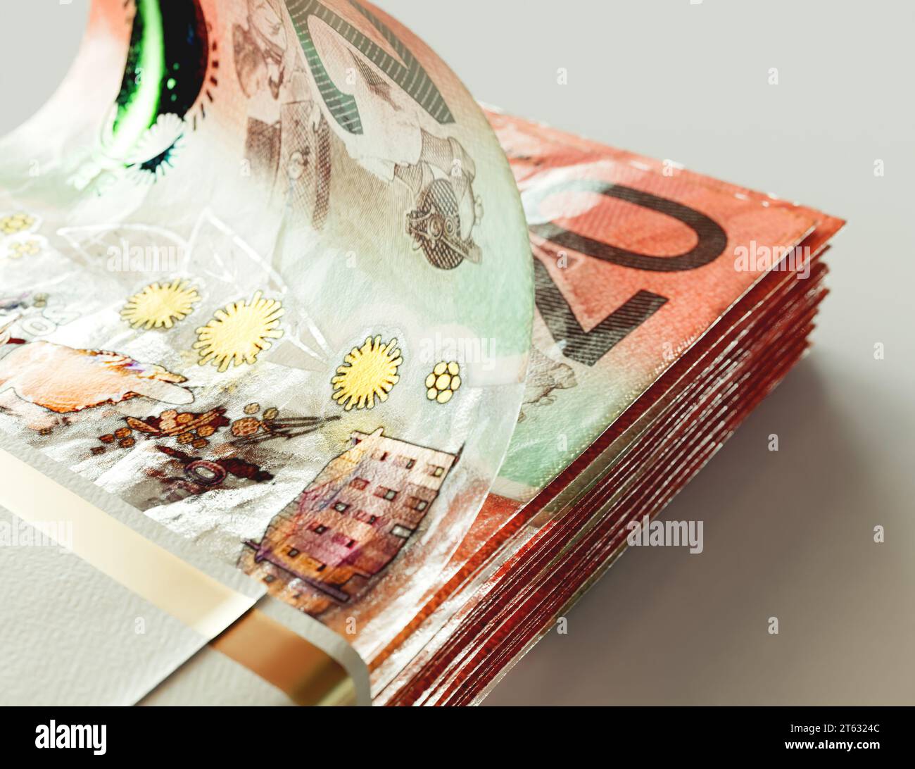A bundled wad of Australlia Dollar banknotes on an isolated light ...