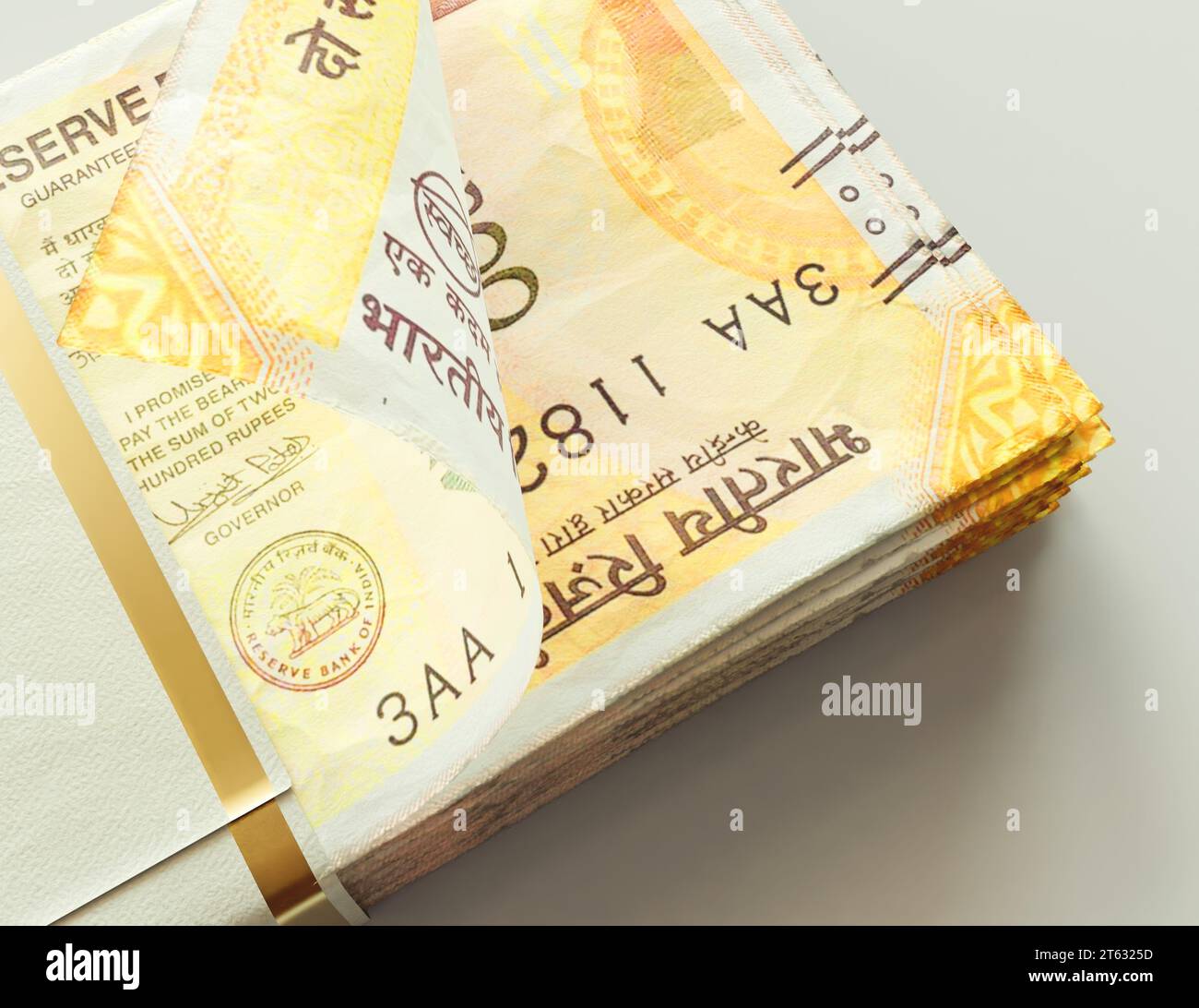 A bundled wad of India Rupee banknotes on an isolated light background ...