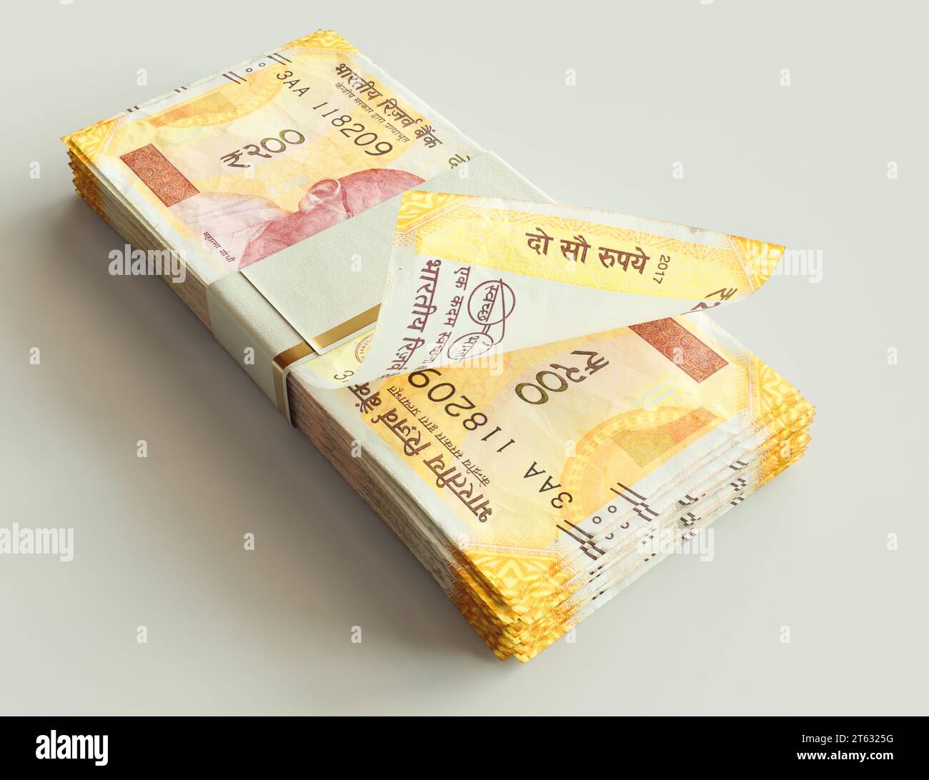 A bundled wad of India Rupee banknotes on an isolated light background ...