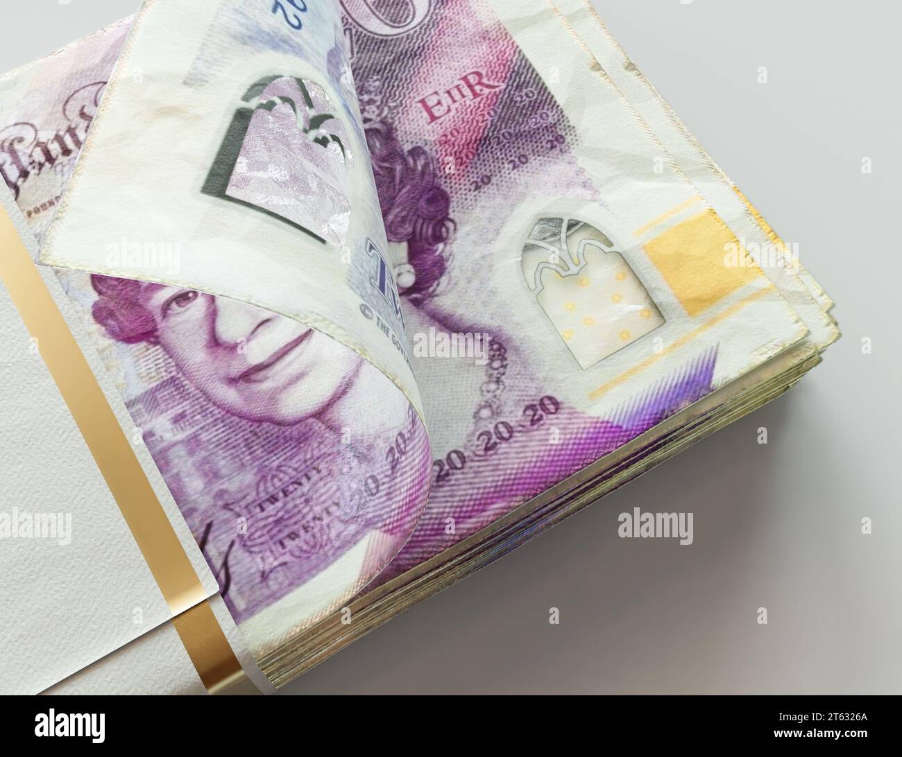 A bundled wad of british pound banknotes on an isolated light ...